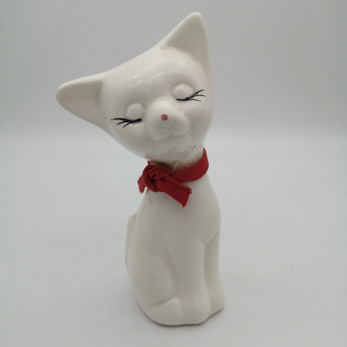 Decorative White Cat Figurine with Red Bow | Sir Mittens